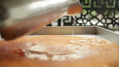 Pouring Syrup On Arabian Dessert | Stock Video | Pond5