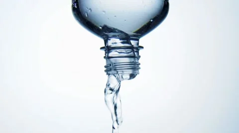 Pouring water out of a plastic bottle | Stock Video | Pond5