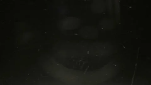 Pouring yellow fizzy liquid into a glass... | Stock Video | Pond5