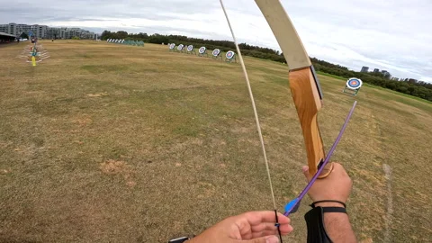 POV An archer nocks an arrow to his bow ... | Stock Video | Pond5