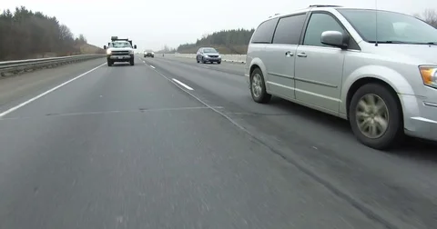 POV driving rear view on highway with tr... | Stock Video | Pond5