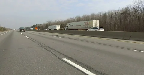 POV driving rear view on highway with tr... | Stock Video | Pond5