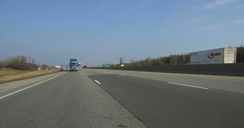 POV driving rear view on highway with tr... | Stock Video | Pond5