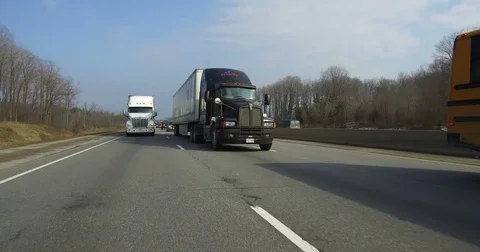 POV driving rear view on highway with tr... | Stock Video | Pond5