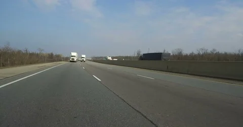 POV driving rear view on highway with tr... | Stock Video | Pond5