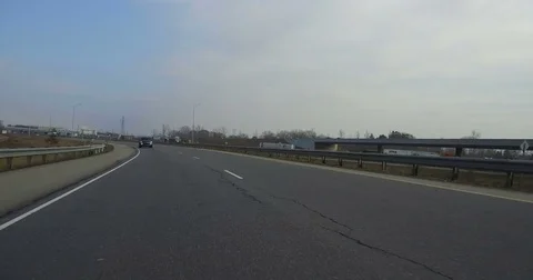 POV driving rear view on highway with tr... | Stock Video | Pond5