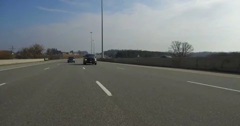POV driving rear view on highway with tr... | Stock Video | Pond5