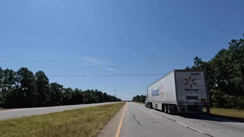 POV driving rural highway Walmart semi t... | Stock Video | Pond5