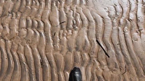 POV female feet walking on textured wet ... | Stock Video | Pond5