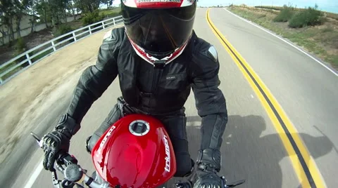POV of a man riding a red motorcycle. | Stock Video | Pond5