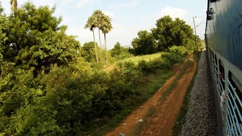 POV from outside moving Indian train blu... | Stock Video | Pond5