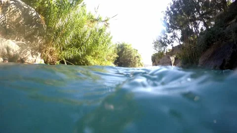 POV plunge into spring water pool. Beaut... | Stock Video | Pond5