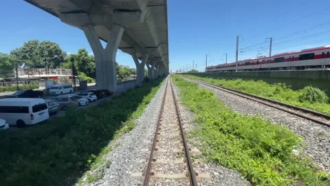 POV riding on train with blue sky and tr... | Stock Video | Pond5