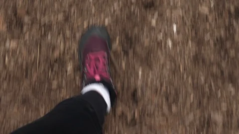 POV shot looking down at feet walking | Stock Video | Pond5