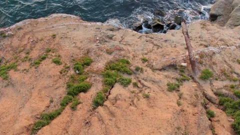 A POV shot looking over the edge of a cl... | Stock Video | Pond5
