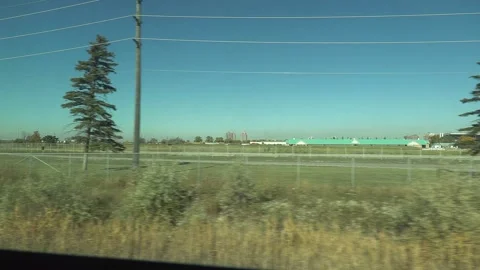 POV side view driving shot from a train ... | Stock Video | Pond5