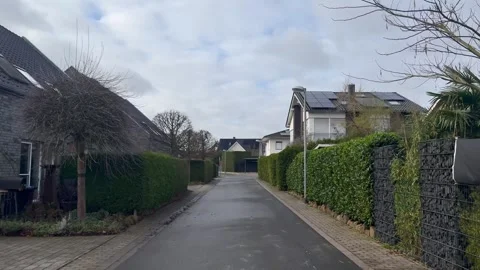 Pov walk on street in upper class housin... | Stock Video | Pond5