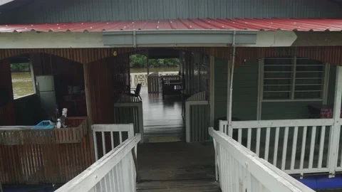 POV: Walking in a house on the river in ... | Stock Video | Pond5