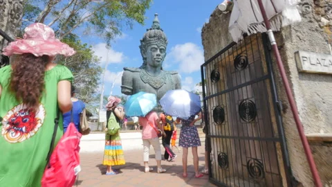 POV Walking Through a Gate to the Garuda... | Stock Video | Pond5