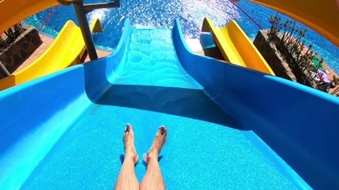 POV on the water slide in the water park... | Stock Video | Pond5