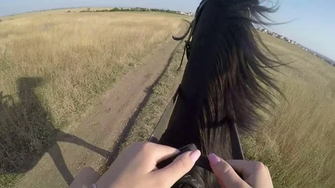 PoV: Young girl horseback rider riding h... | Stock Video | Pond5