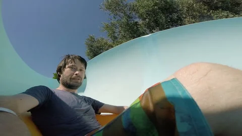 POV: Young man sliding down at the aquap... | Stock Video | Pond5