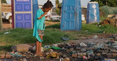Poverty, poor, Black African child brush... | Stock Video | Pond5