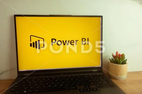 Power BI business analytics service logo on laptop ~ Premium Photo ...