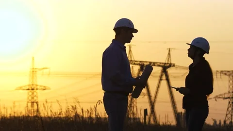 Power engineers are discussing the work ... | Stock Video | Pond5