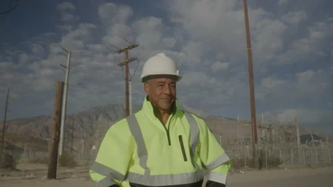 Power Grid Worker in Safety Gear in Fron... | Stock Video | Pond5