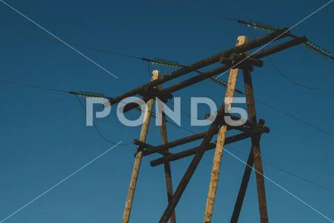 Power line post. high voltage tower on the sky background Stock Photo ...