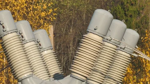Power lines with sun rays on blue sky. H... | Stock Video | Pond5