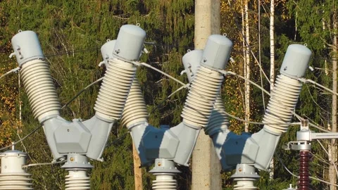 Power lines with sun rays on blue sky. H... | Stock Video | Pond5