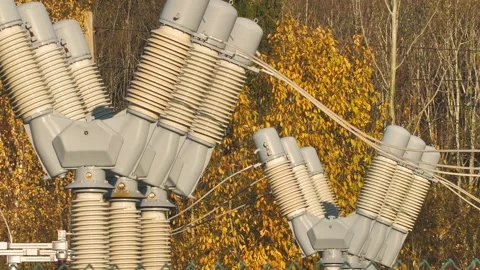 Power lines with sun rays on blue sky. H... | Stock Video | Pond5