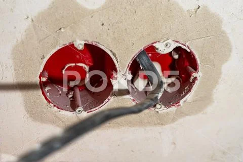 Photograph: Power socket boxes with electric wires. Close-up ...