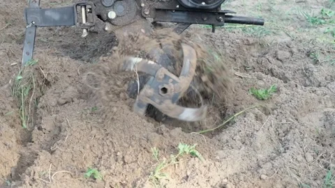 Powerful cultivator, Tiller. Land cultiv... | Stock Video | Pond5