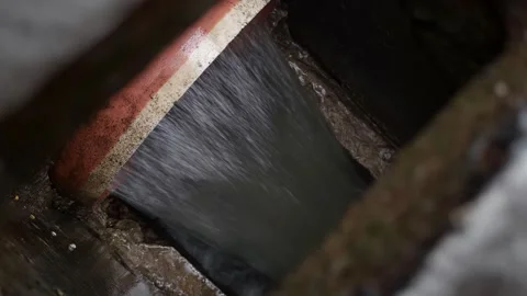 Powerful flow of wasted water in rain se... | Stock Video | Pond5
