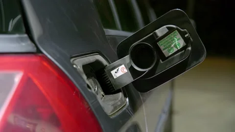 Ppening the fuel filler flap in the car ... | Stock Video | Pond5