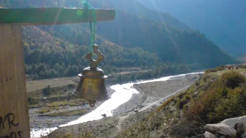 A prayer bell hanging on a mountain back... | Stock Video | Pond5