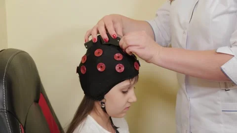 Preparing for an EEG analysis of the bra... | Stock Video | Pond5