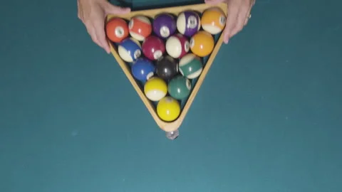 Preparing for a game of pool with a tria... | Stock Video | Pond5