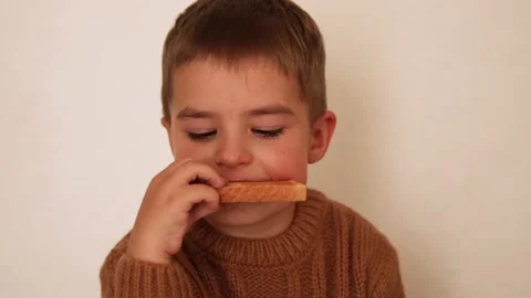 Kids Eating Bread Stock Footage ~ Royalty Free Stock Videos | Pond5