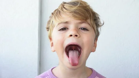 Preschool child widely open mouth showin... | Stock Video | Pond5