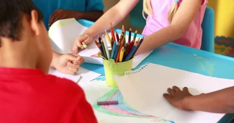 Preschool class drawing at table in clas... | Stock Video | Pond5