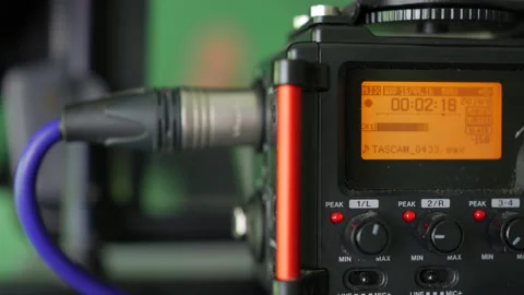 A presenter on green screen recording in... | Stock Video | Pond5