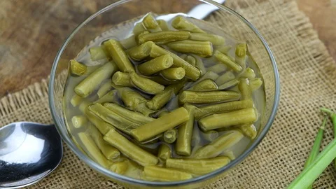 Preserved Green Beans on a rotating plat... | Stock Video | Pond5