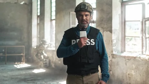 Press worker with helmet and vest giving... | Stock Video | Pond5