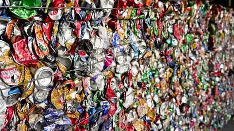 Pressed beverage cans stacked for recycl... | Stock Video | Pond5