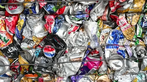 Pressed beverage cans stacked for recycl... | Stock Video | Pond5