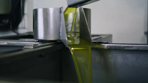 Pressed oil flowing pipe at facility clo... | Stock Video | Pond5